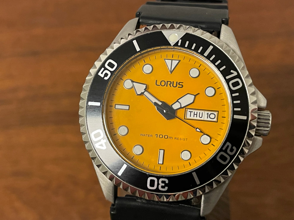 (1990s) Lorus (by Seiko) VX43-X041 diver - orange dial w/ white marker ...
